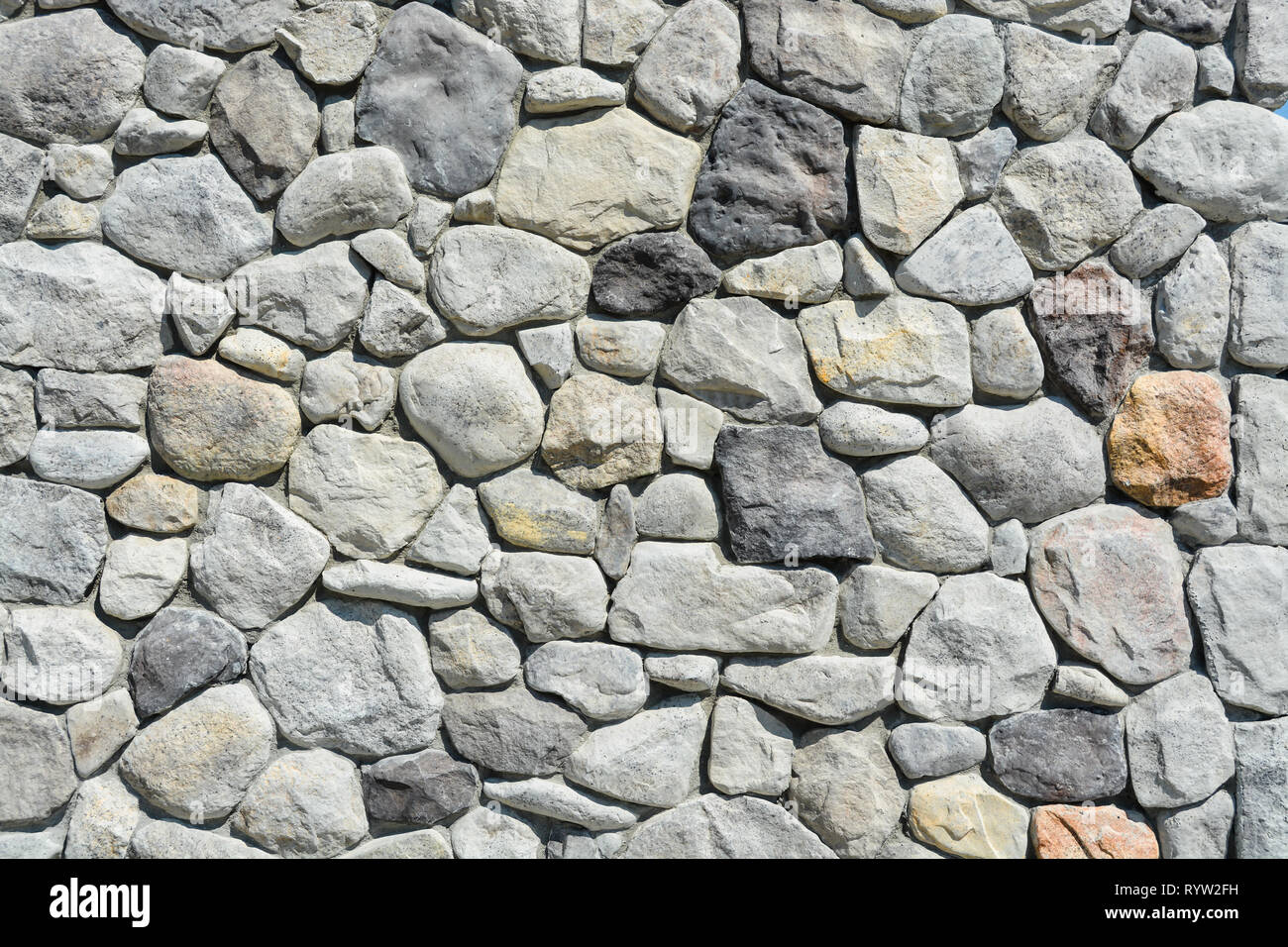Assorted stones in wall texture background. Modern building material ...
