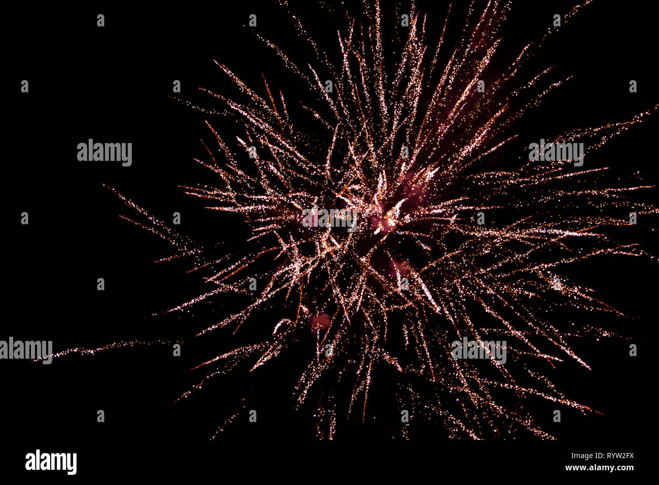 fireworks break in the night sky Stock Photo - Alamy