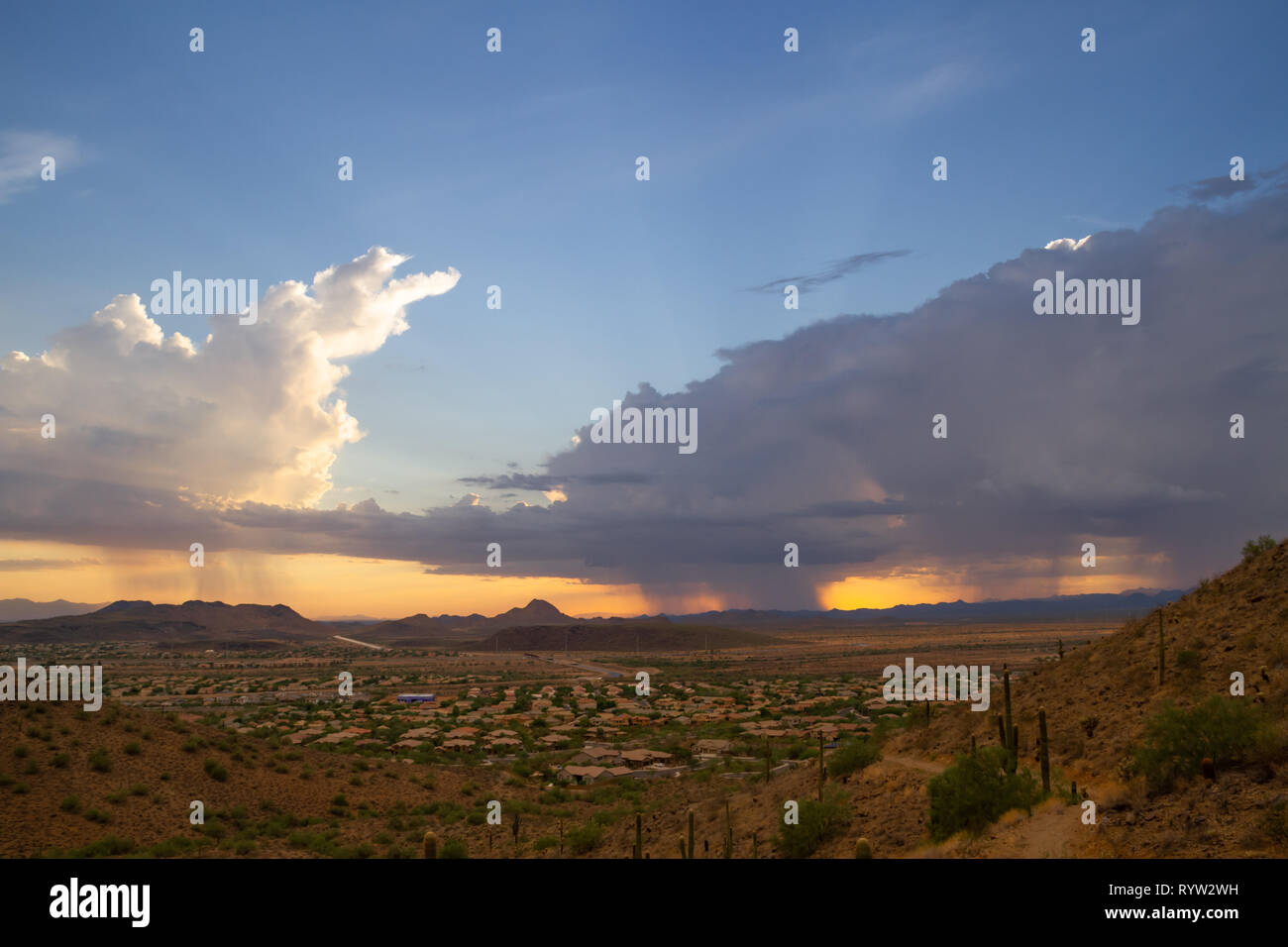 A monsoon storm over the desert of Arizona during sunset Stock Photo ...