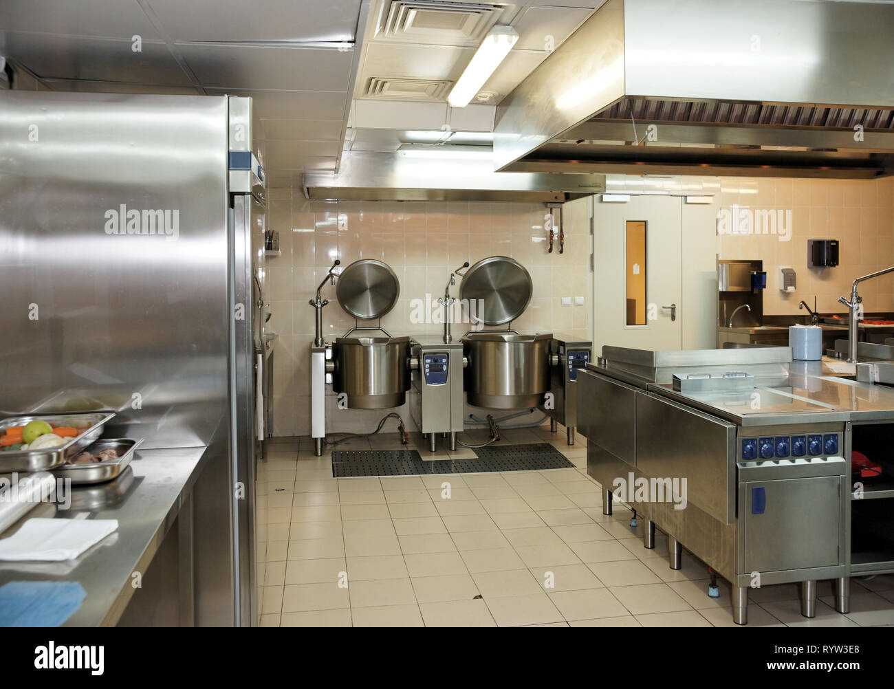 Typical kitchen of a restaurant shot in operation Stock Photo - Alamy