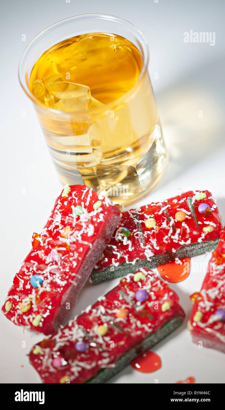 Garnished sweet wafer pastry bar with the toppings of sweet candy and ...