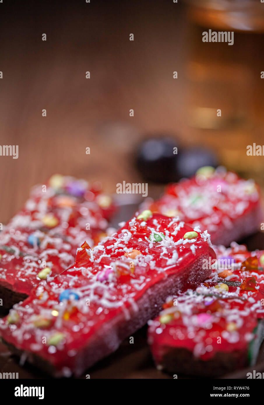 Garnished sweet wafer pastry bar with the toppings of sweet candy and ...