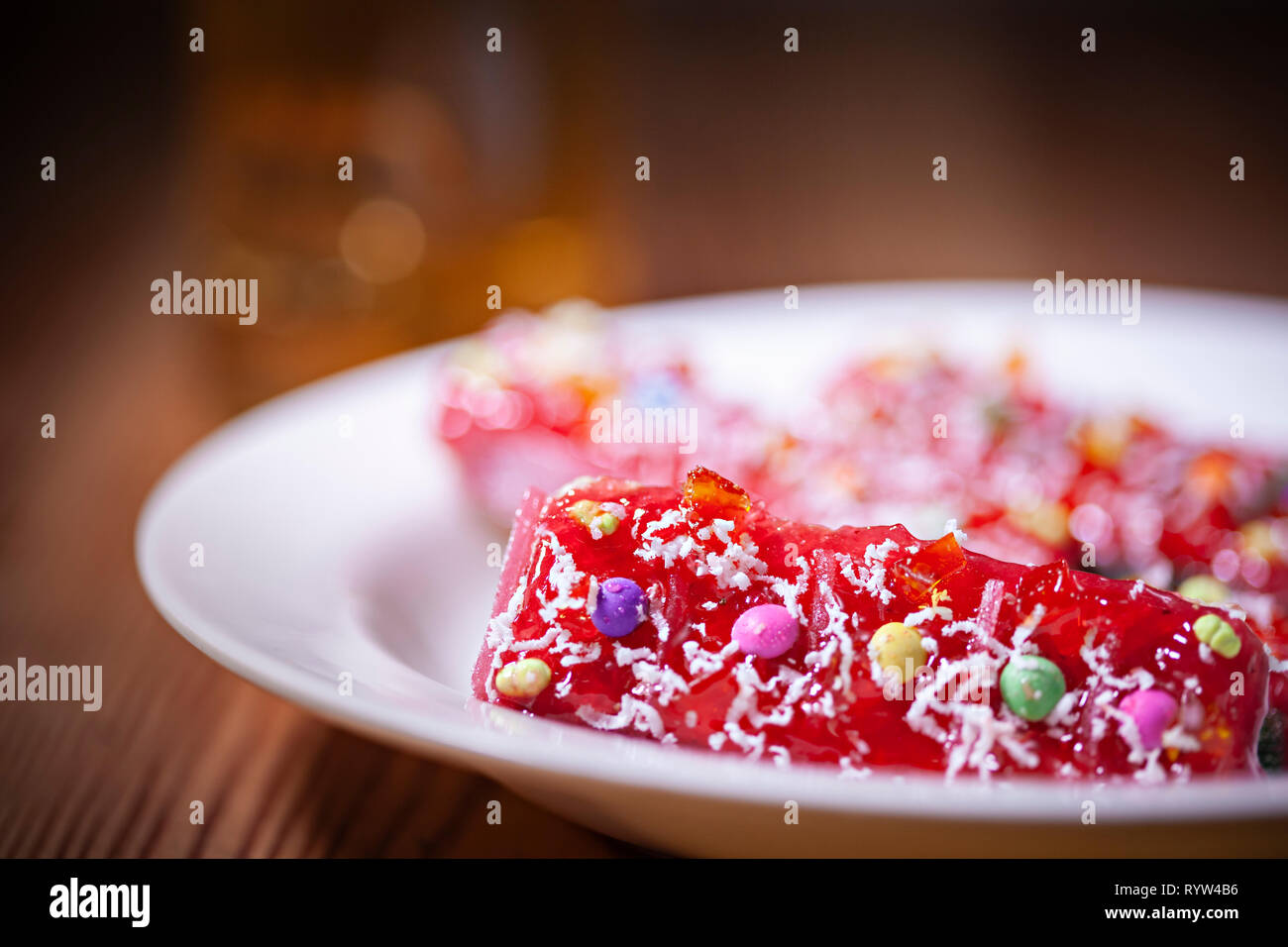 Garnished sweet wafer pastry bar with the toppings of sweet candy and ...