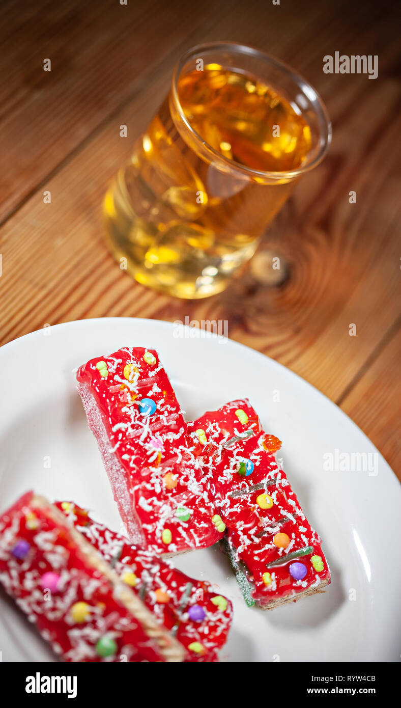 Garnished sweet wafer pastry bar with the toppings of sweet candy and ...