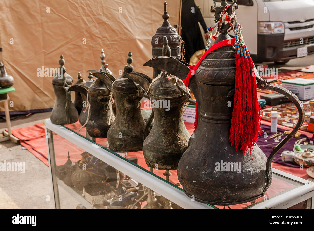 Antique traditional Arabic coffee pots on a market in Riyadh, Saudi ...