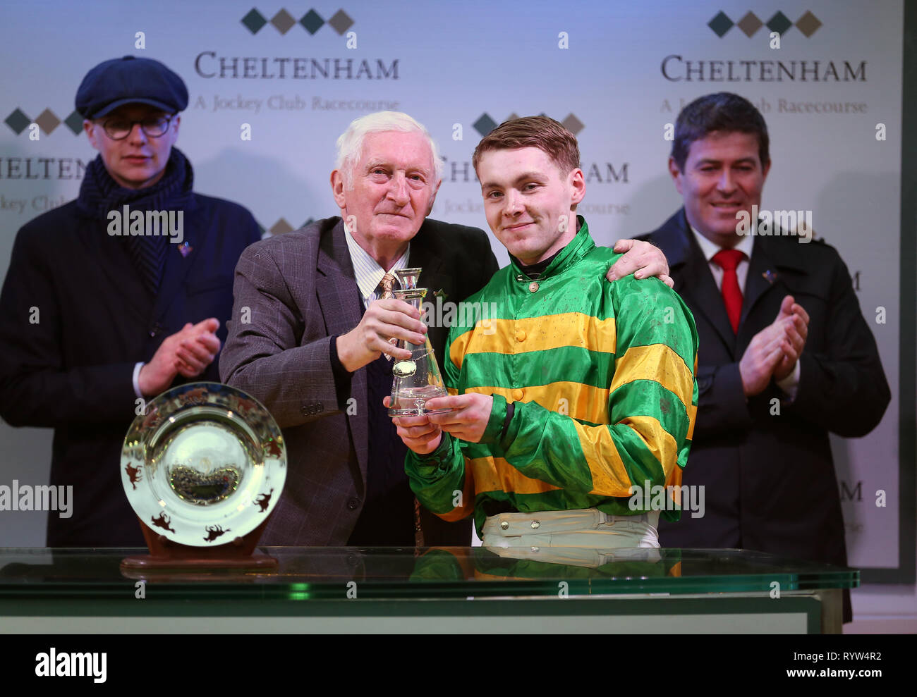 Martin Pipe (left) presents jockey Jonjo O'Neill Jr (right) with a ...