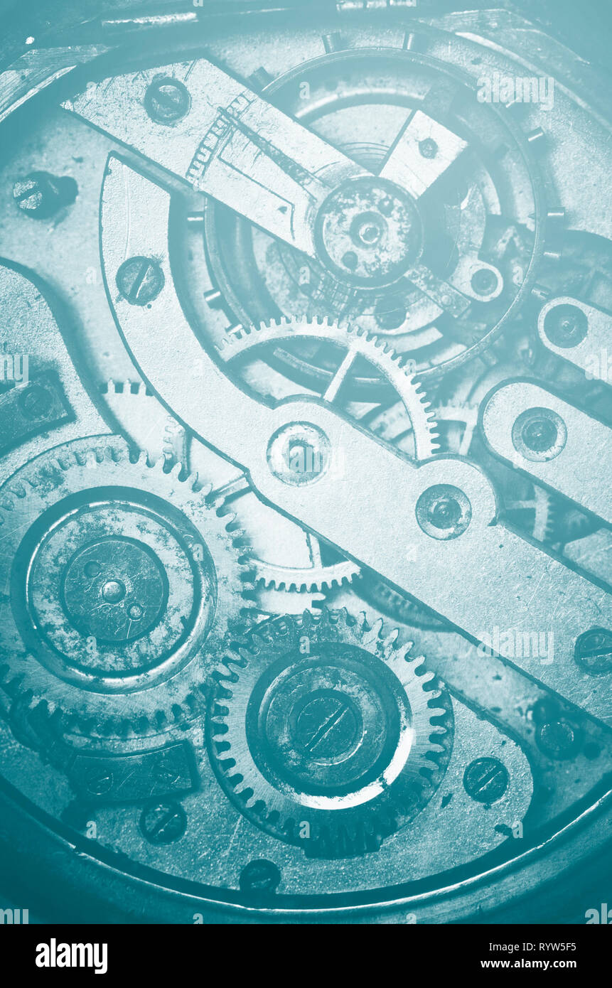 Vintage gear and cogs in pocket watch mechanism. Inside old clock ...