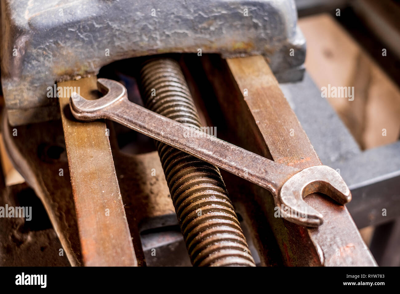 Rusty old vintage wrench on industrial equipment isolated Stock Photo ...