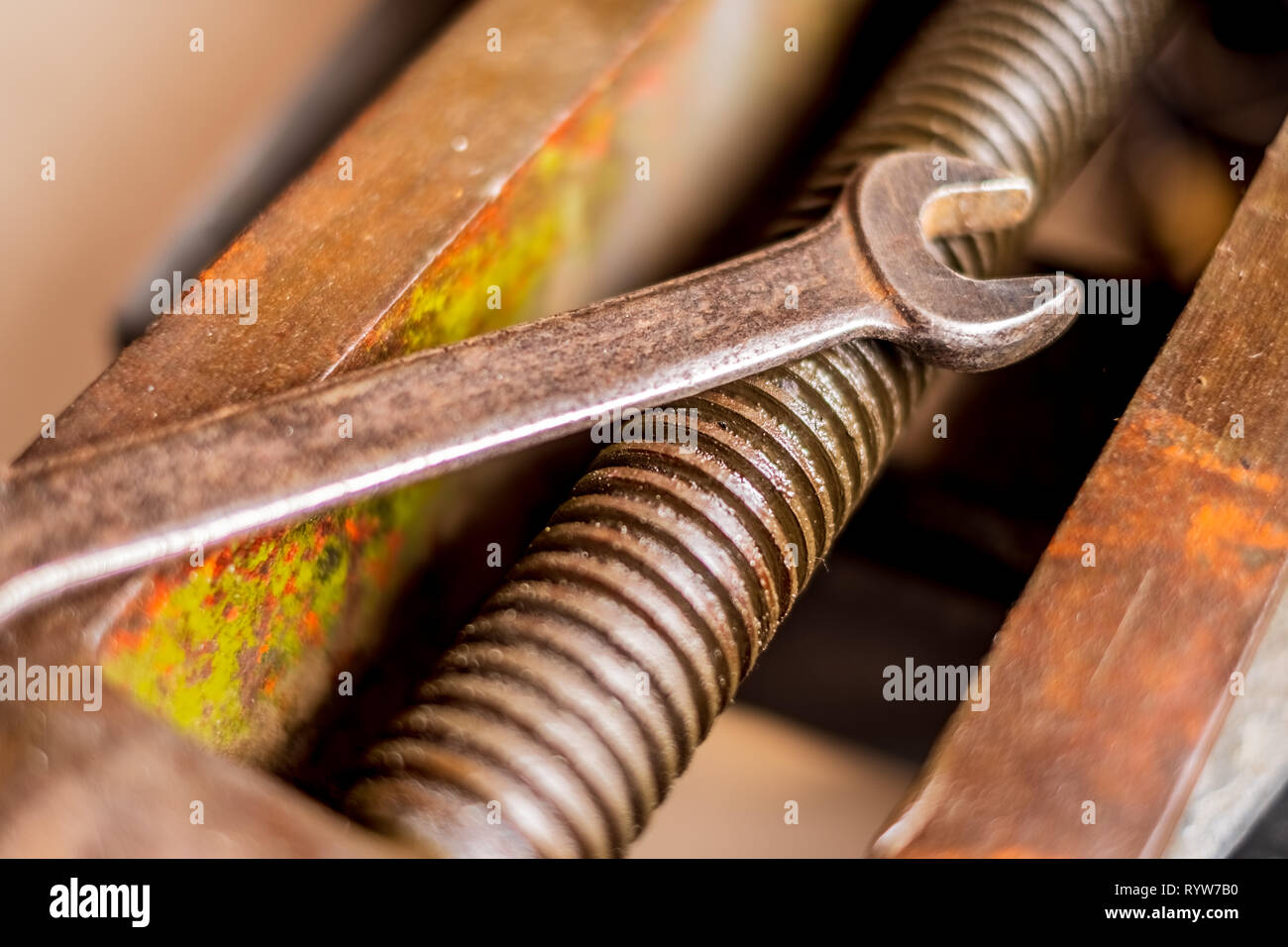 Rusty old vintage wrench on industrial equipment isolated Stock Photo ...
