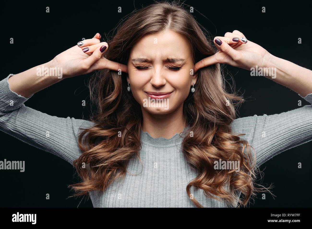 Stressed woman feeling negative emotions Isolated on gray background ...