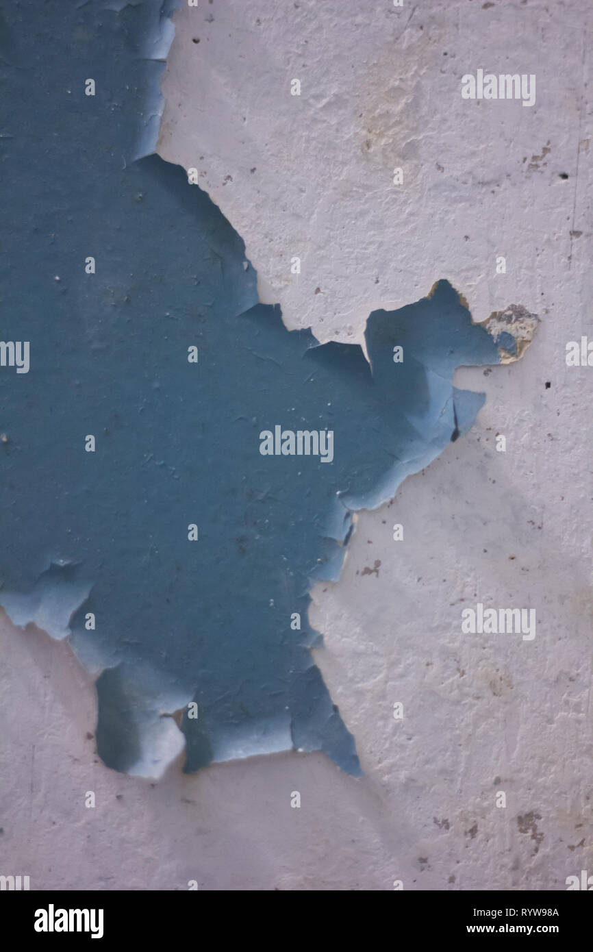 The texture of the wall with cracked blue paint. Cracked wall ...