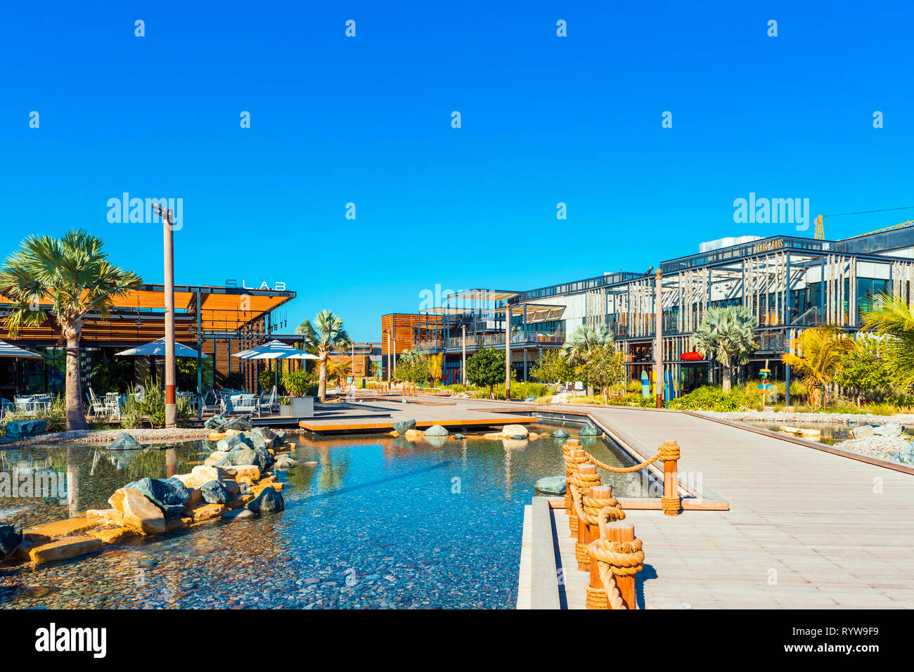 View of the city pool in the city park, Dubai, United Arab Emirates ...