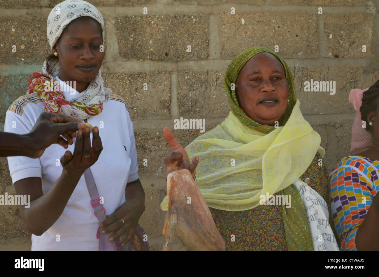 Women fish traders in the coastal village of Ngaparou, Senegal Stock ...