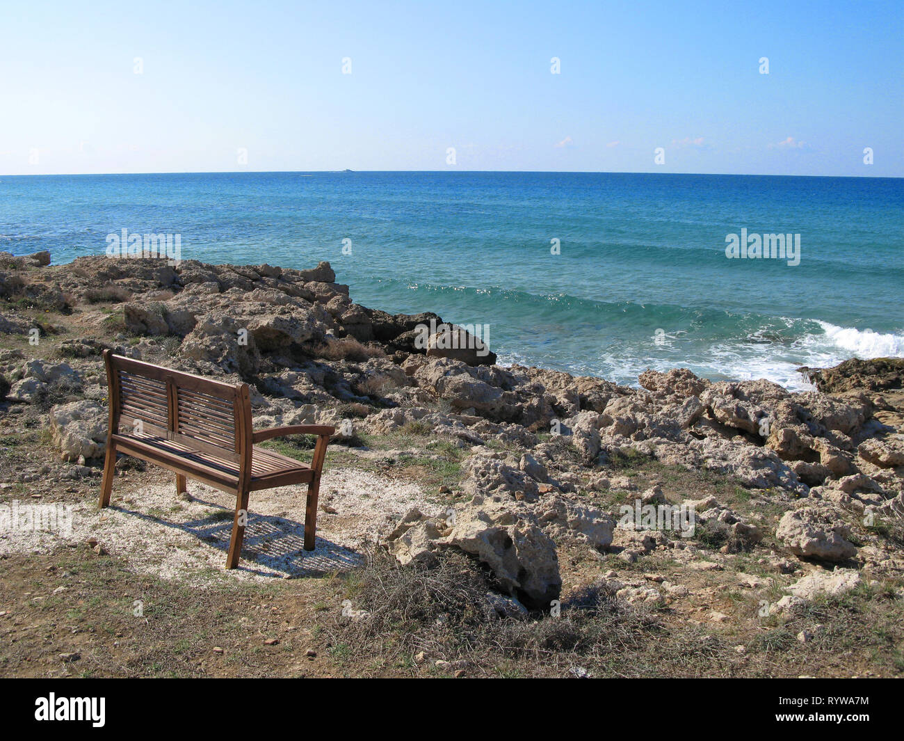 Bench on the seashore. Cyrpus Stock Photo - Alamy