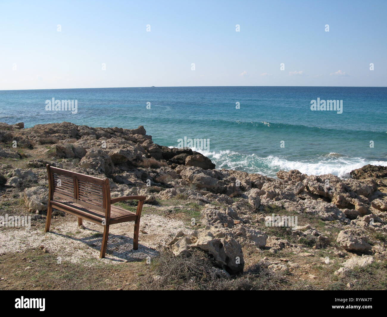 Bench on the seashore. Cyrpus Stock Photo - Alamy