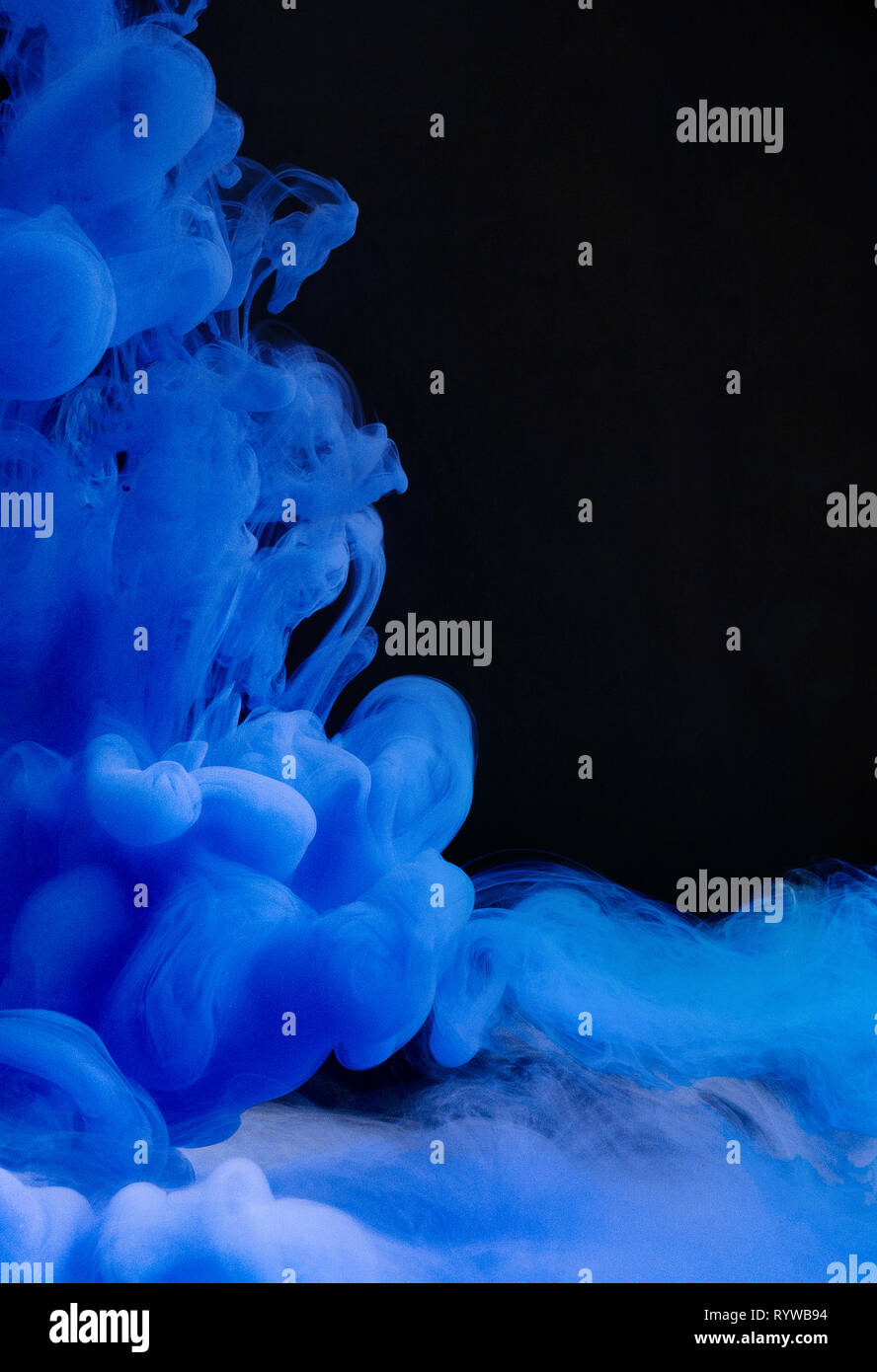 Colored paint splash underwater Stock Photo - Alamy