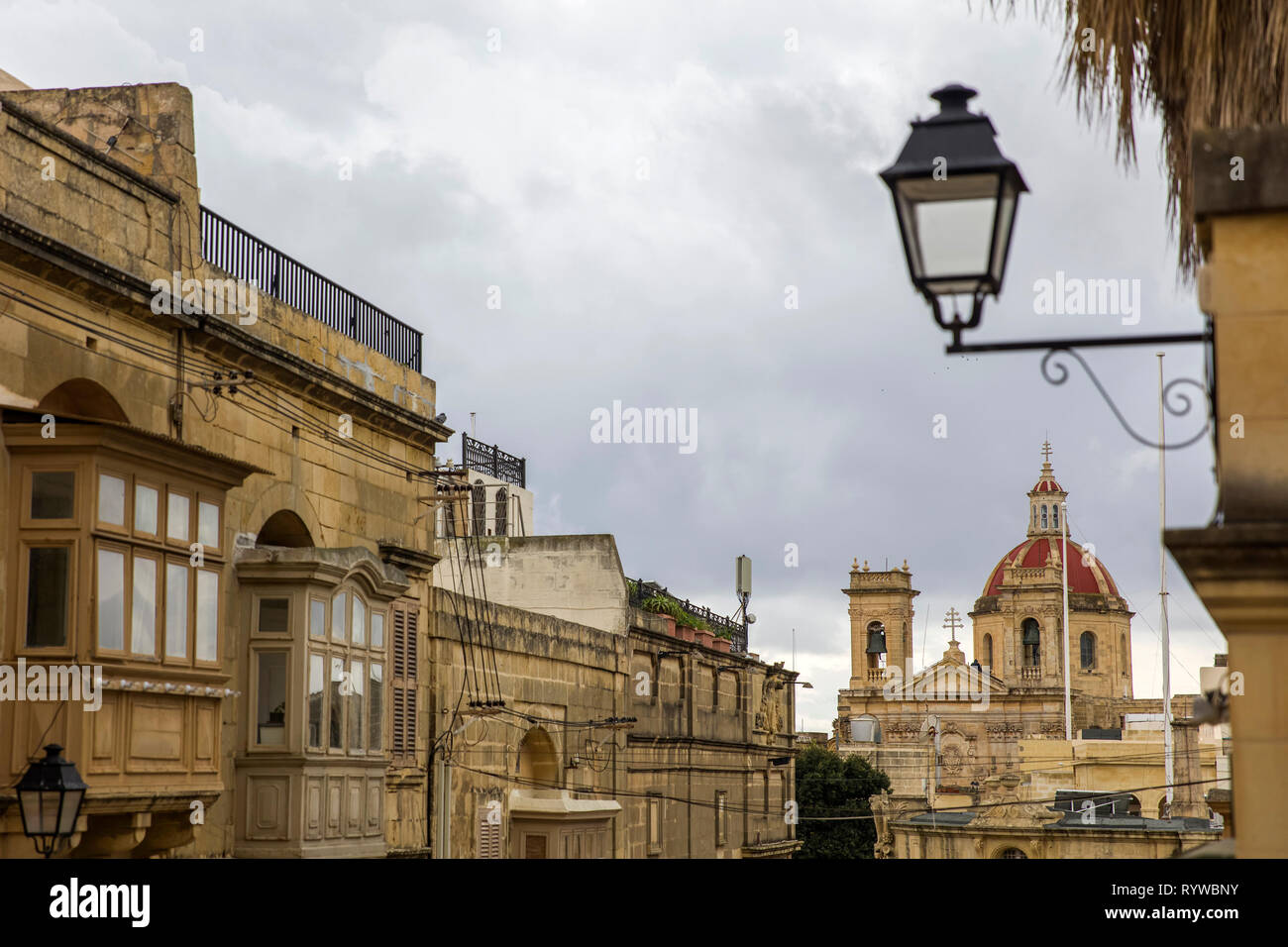 Details of traditional, wooden balcony and stone facade, typical for ...
