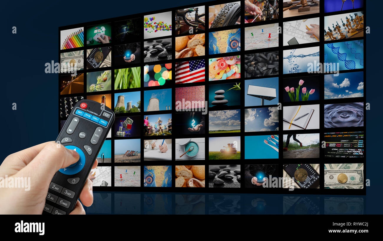 TV screen with lot of pictures and hands of man with remote control ...