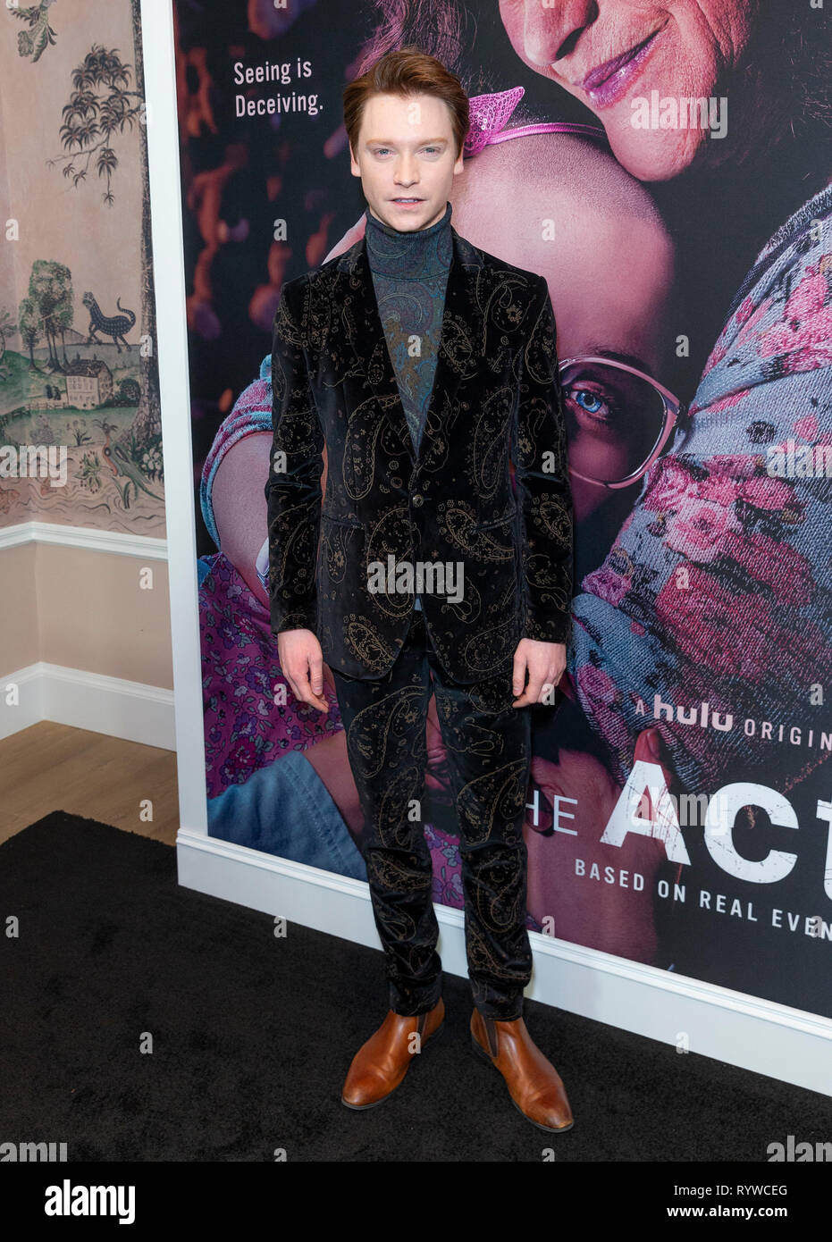 Calum Worthy wearing suit by Etro attends the premiere of Hulu's 'The ...