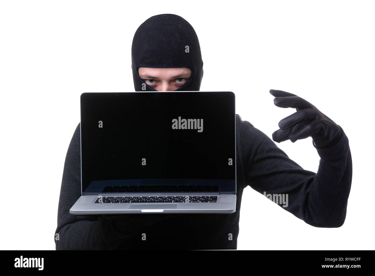 Robber in black mask with laptop with blank screen in hands Stock Photo ...