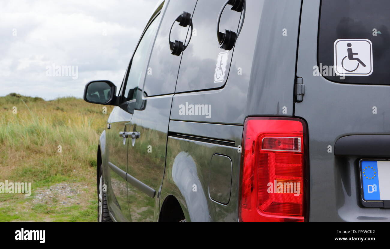 invalid chair sign on car Stock Photo - Alamy