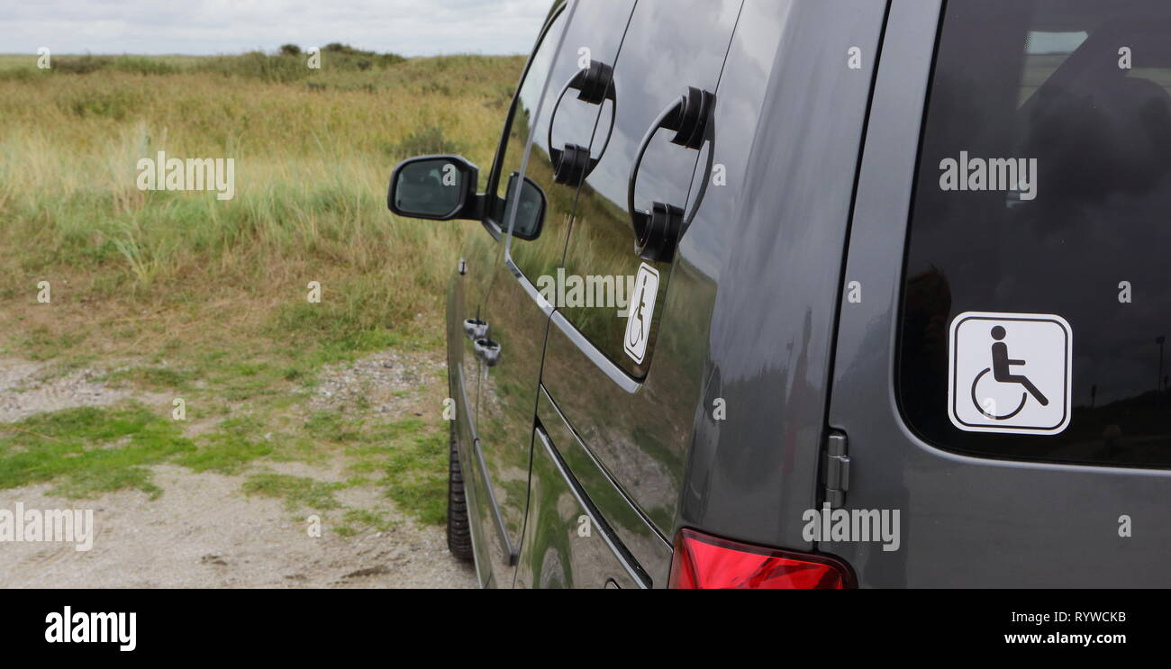 invalid chair sign on car Stock Photo - Alamy