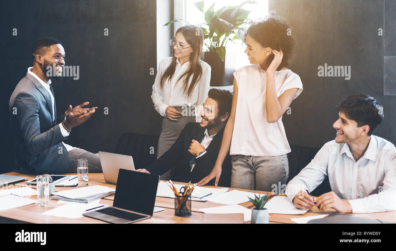 Business people having break and talking at meeting Stock Photo - Alamy