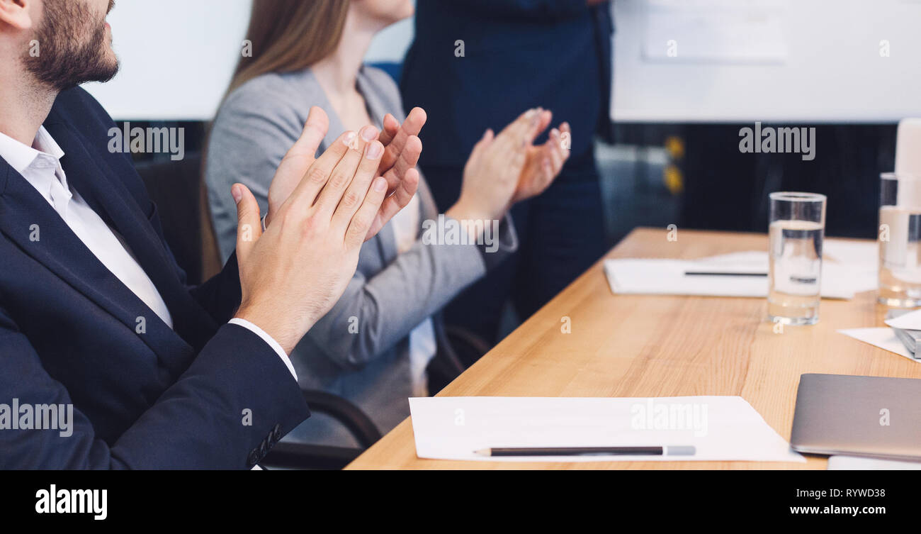 Professional education. Partners clapping hands after seminar Stock ...