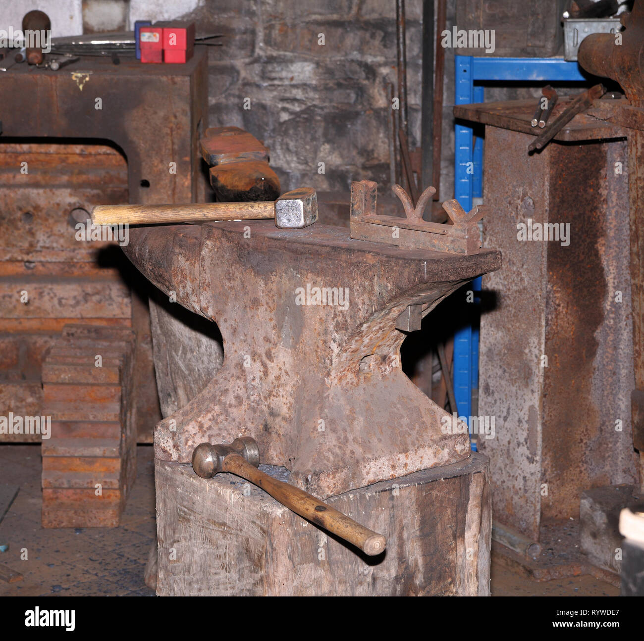 Rusty Iron Anvil in a Machine Shop with Hammer and Mallet Stock Photo ...
