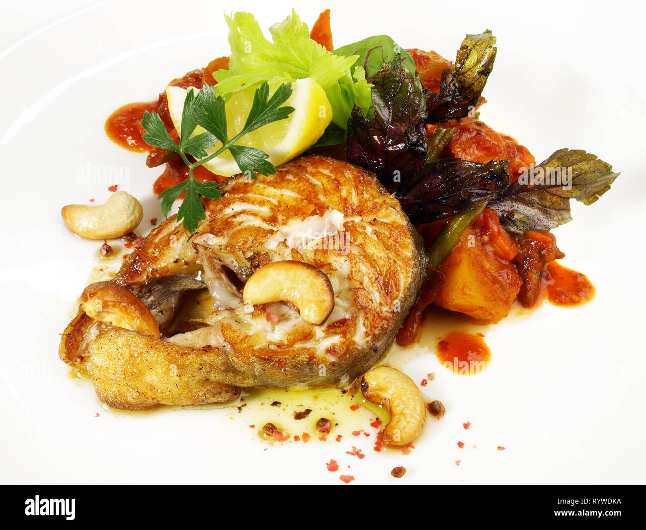Cod Fish Chop on Tomato Stock Photo - Alamy