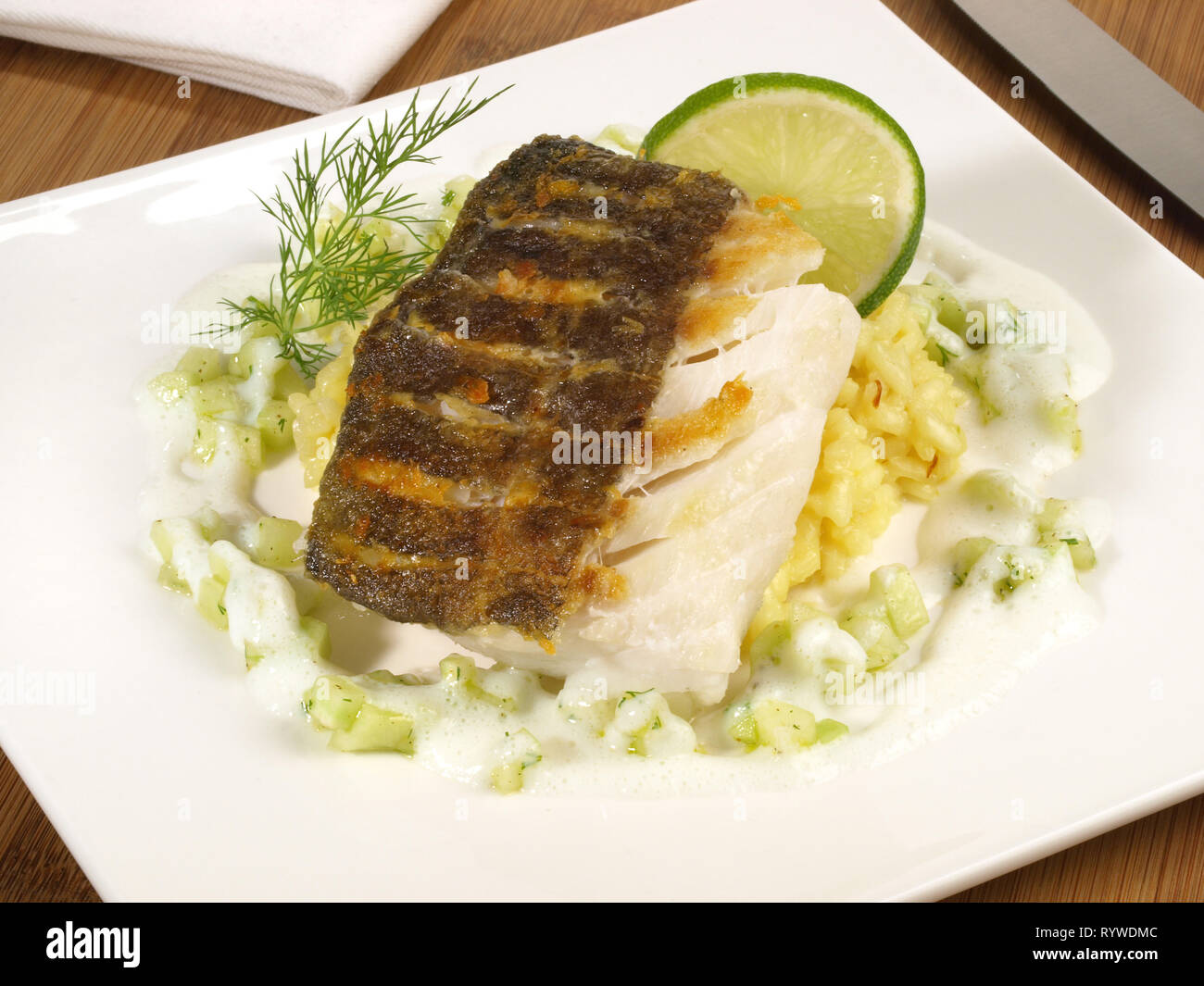 Cod Fish on Rice Stock Photo - Alamy