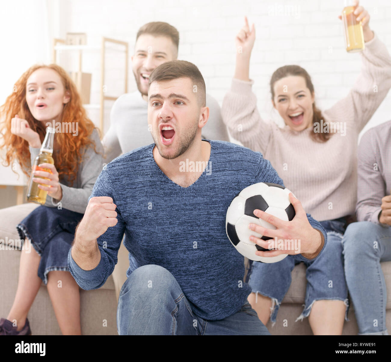Football fans celebrating victory of favourite team Stock Photo - Alamy
