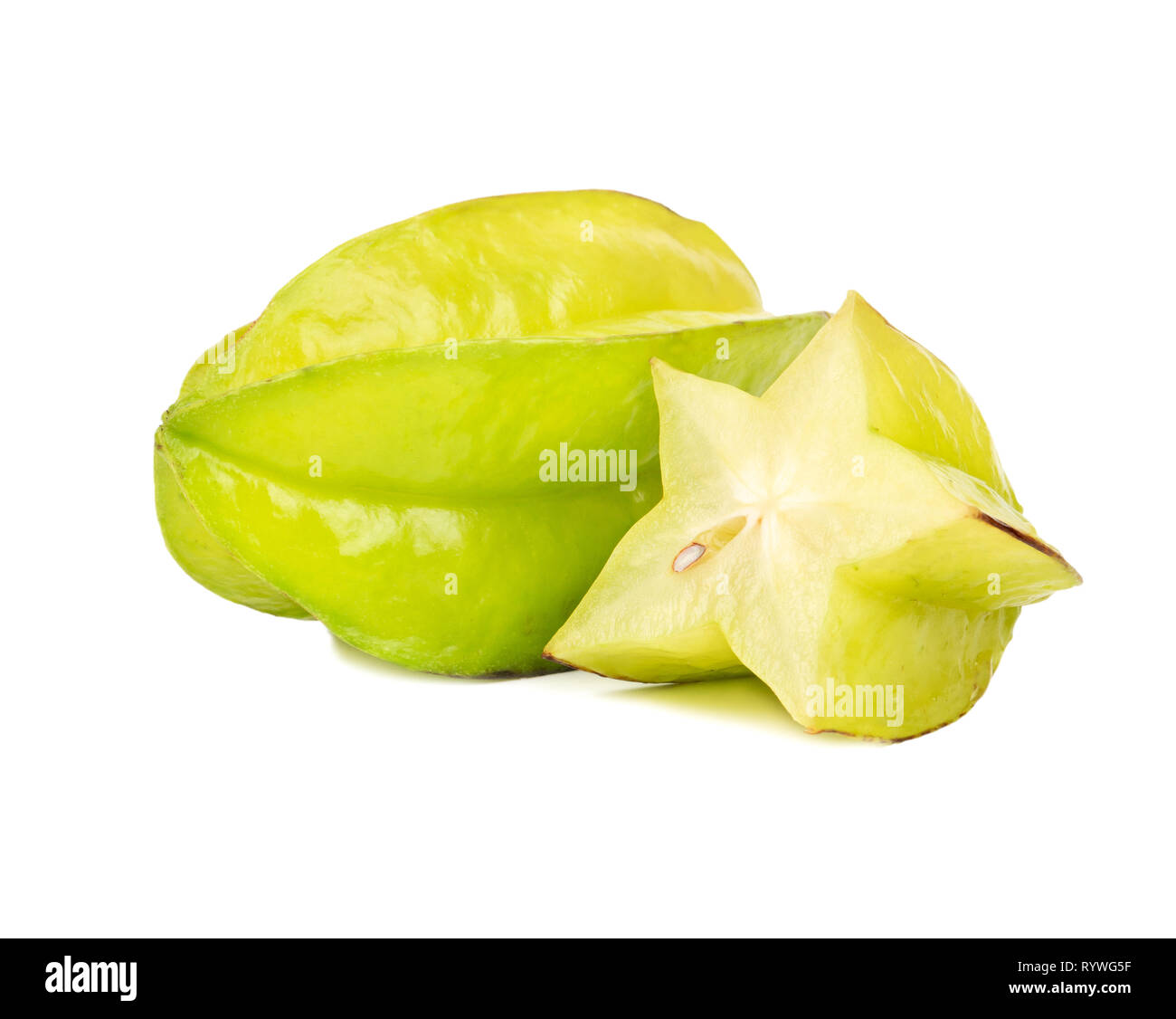 Fresh carambola fruit with juicy half on white background Stock Photo ...