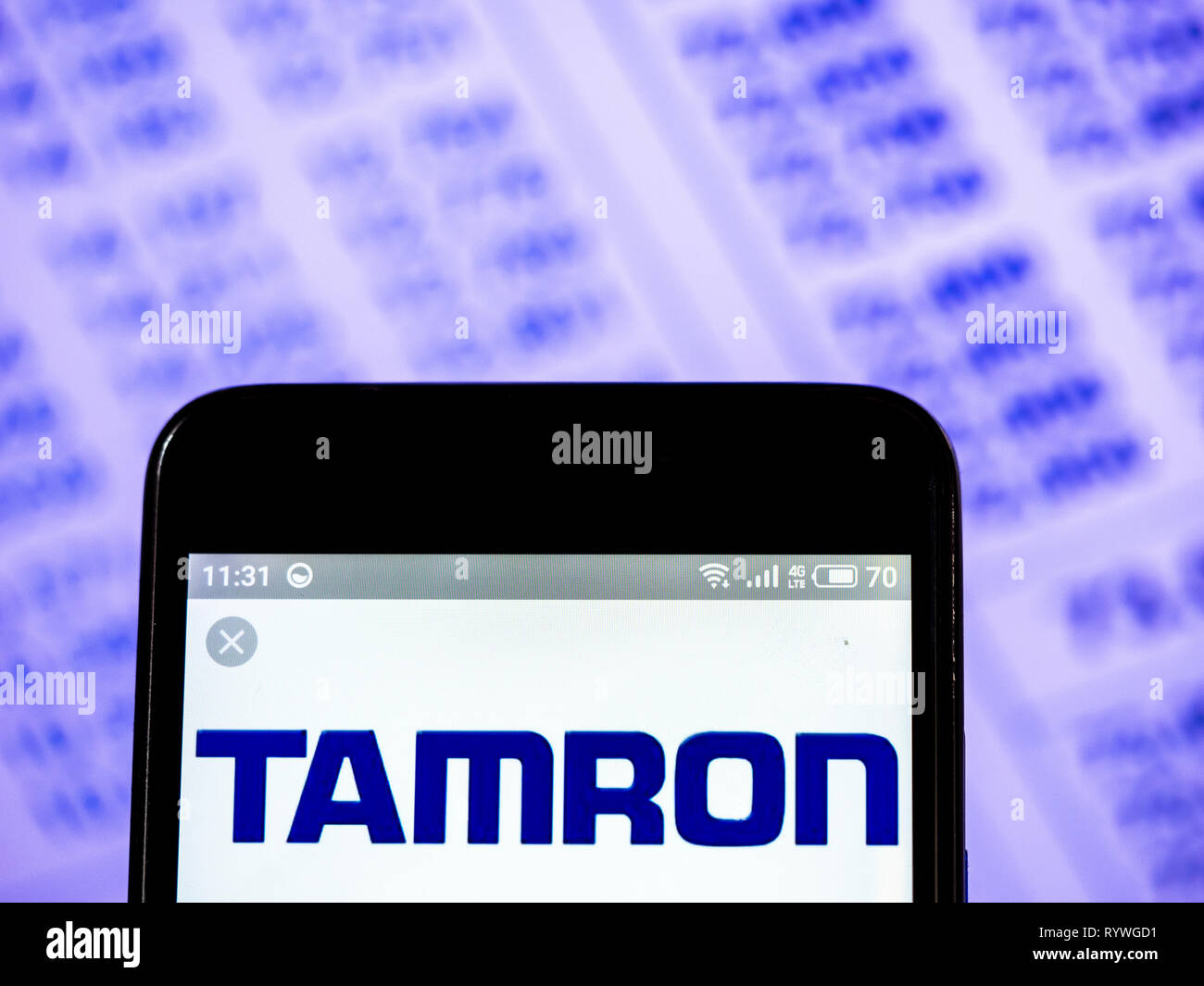 Tamron Co., Ltd. company logo seen displayed on smart phone Stock Photo ...