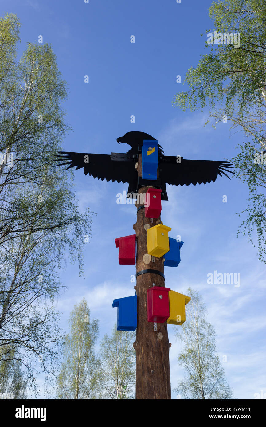 Bird houses art installation in Knivsta's park Stock Photo - Alamy