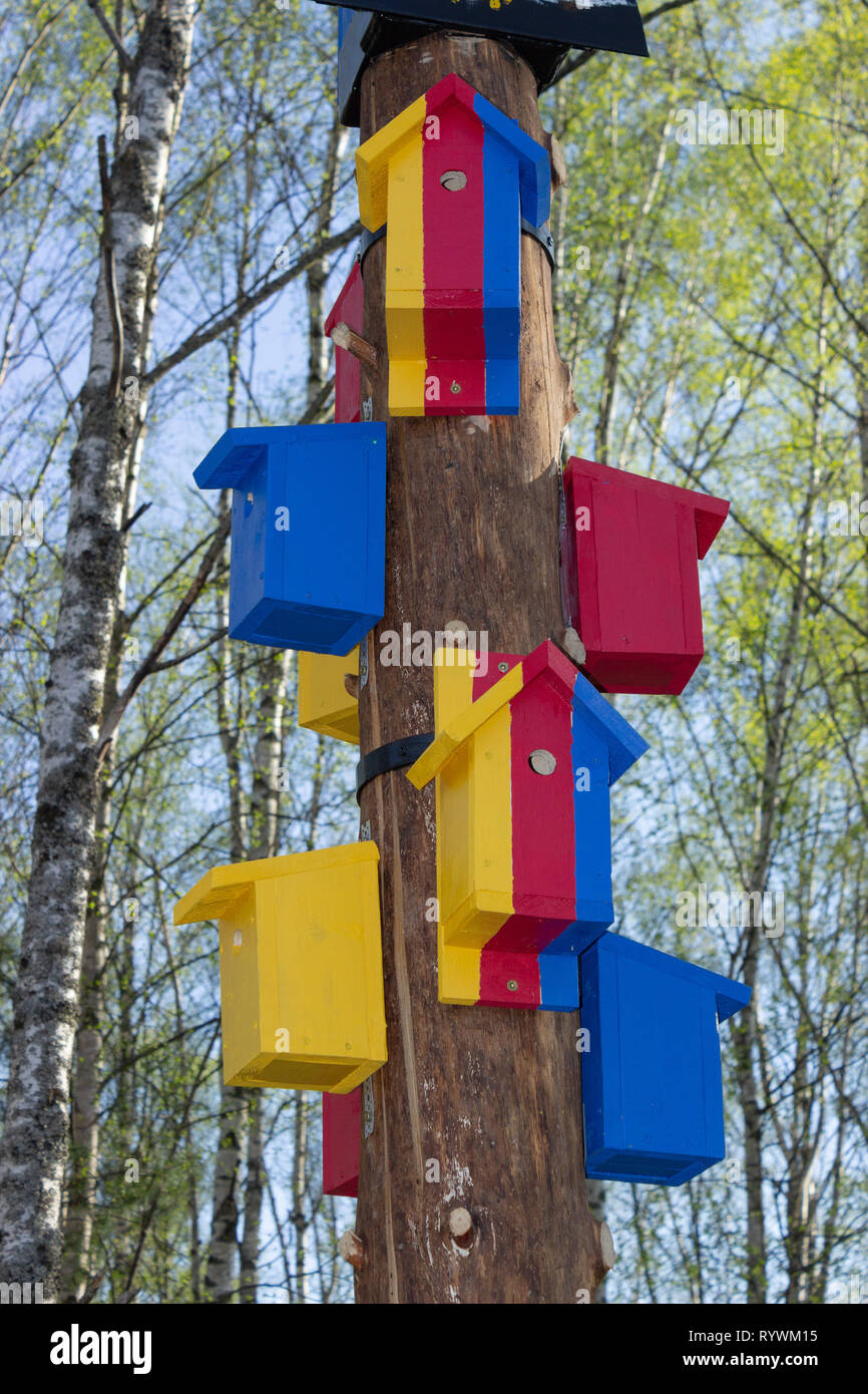 Bird houses art installation in Knivsta's park Stock Photo - Alamy