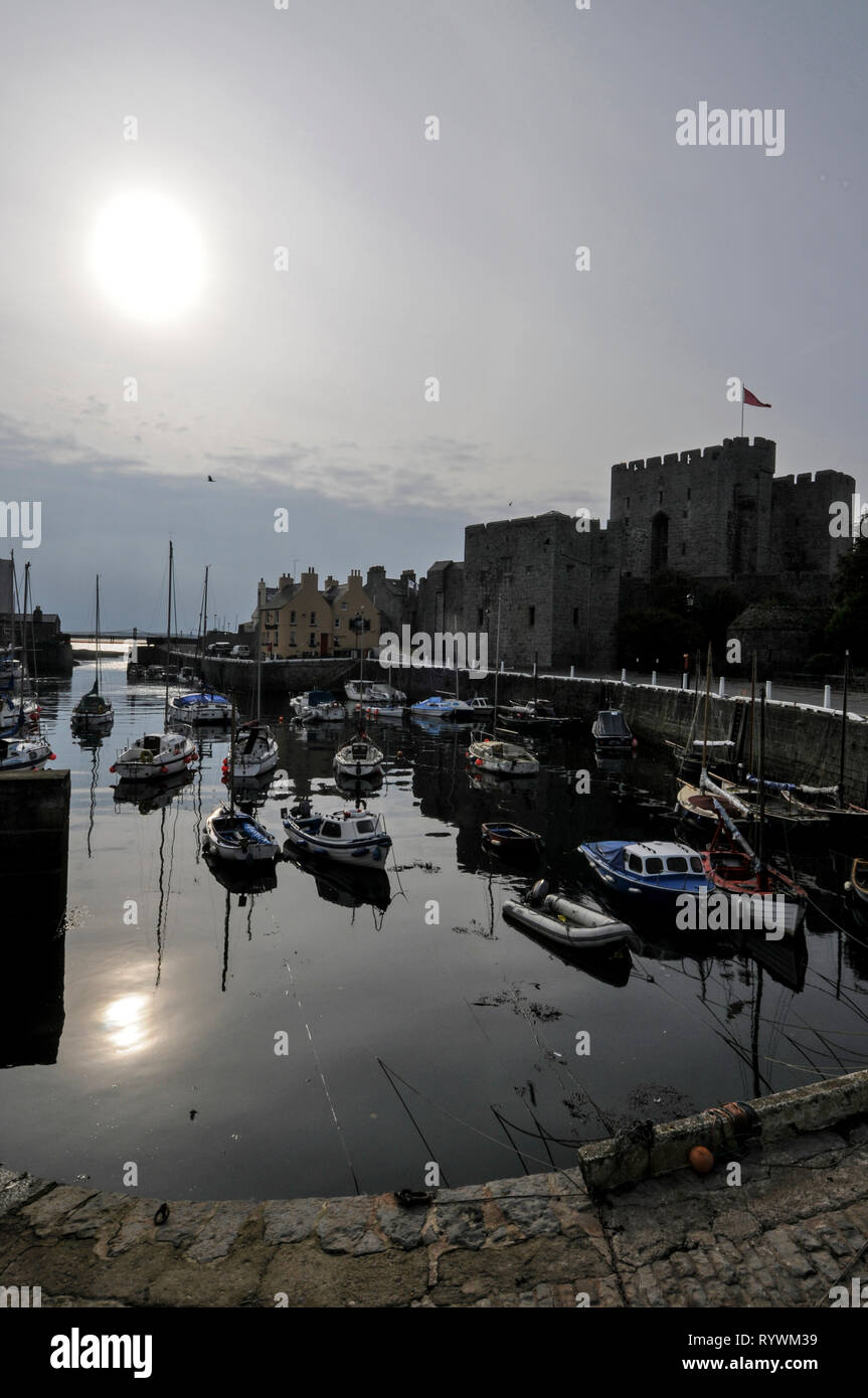 Castletown harbour at low tide and Castle Rusehen in Castletown on the ...