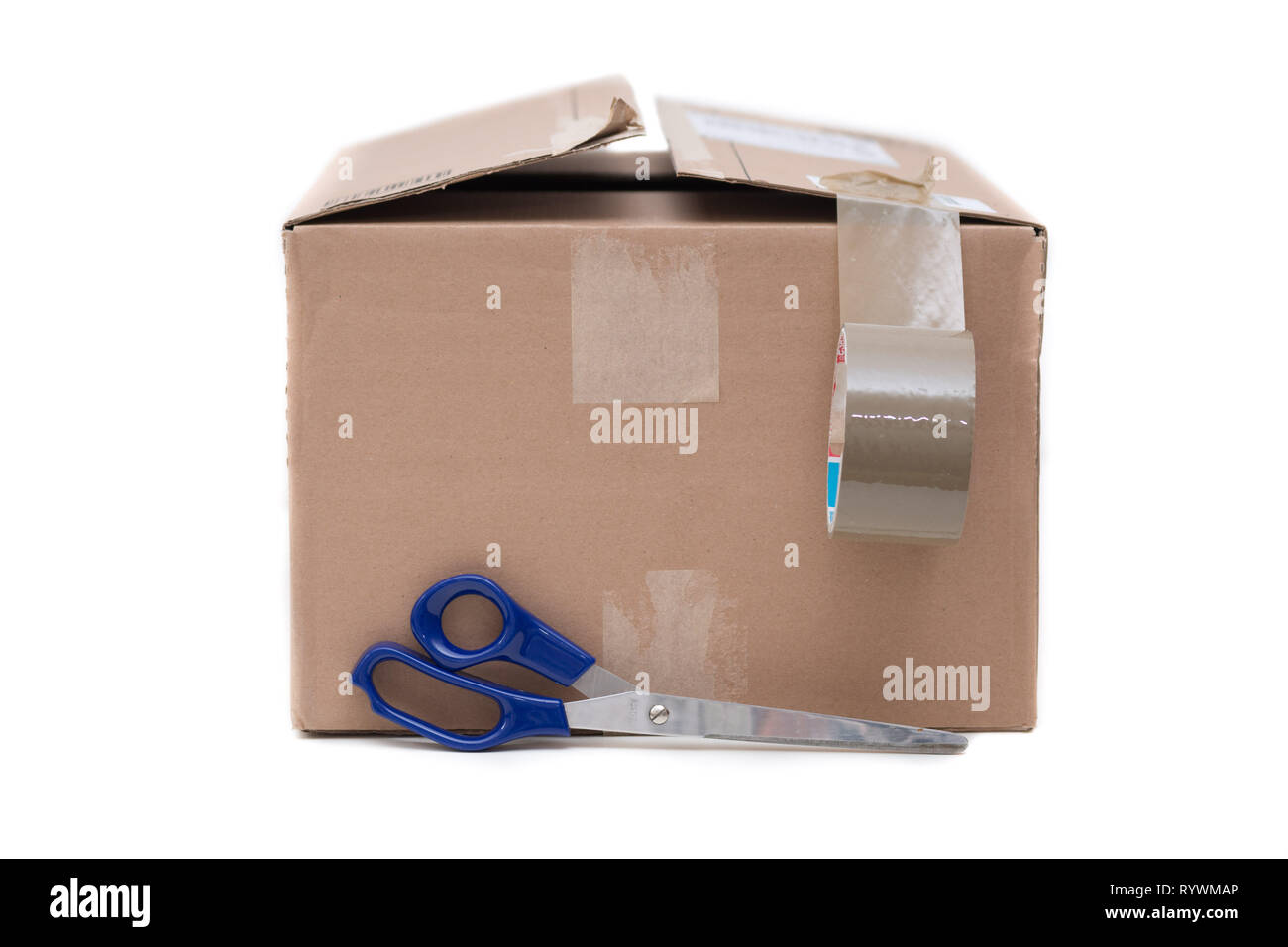 Shipping concept: Cardboard box, scissors and sticky tape Stock Photo ...