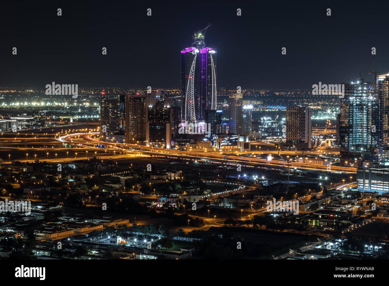 Colourful night time view of downtown Dubai Stock Photo - Alamy