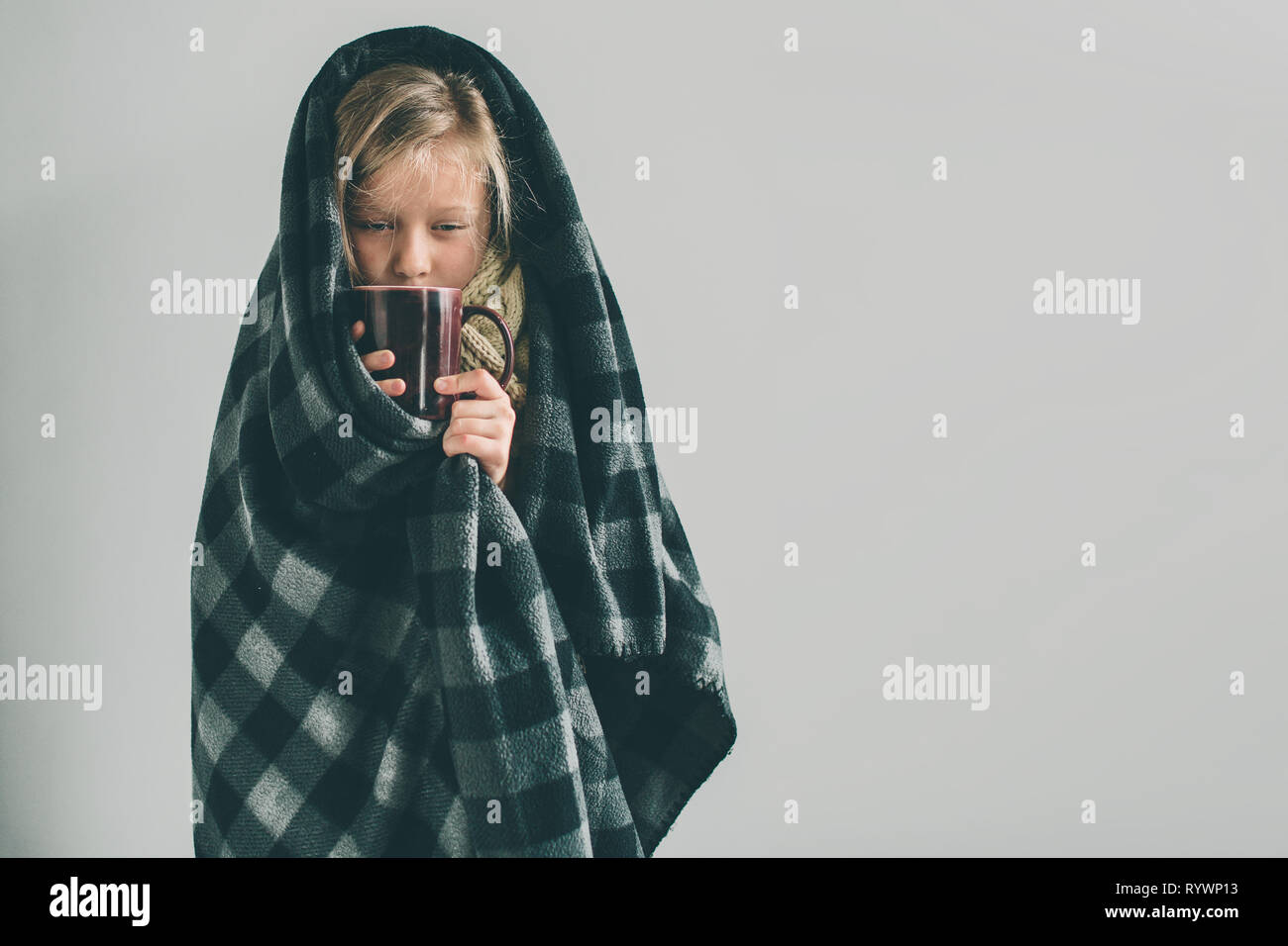 studio picture from a young girl with handkerchief. Sick child isolated ...