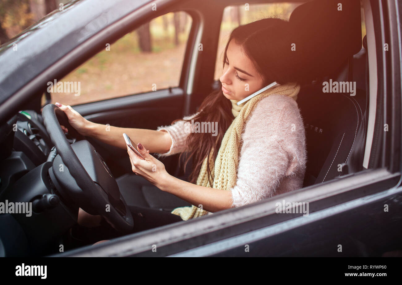 Distracted woman busy talking hi-res stock photography and images - Alamy