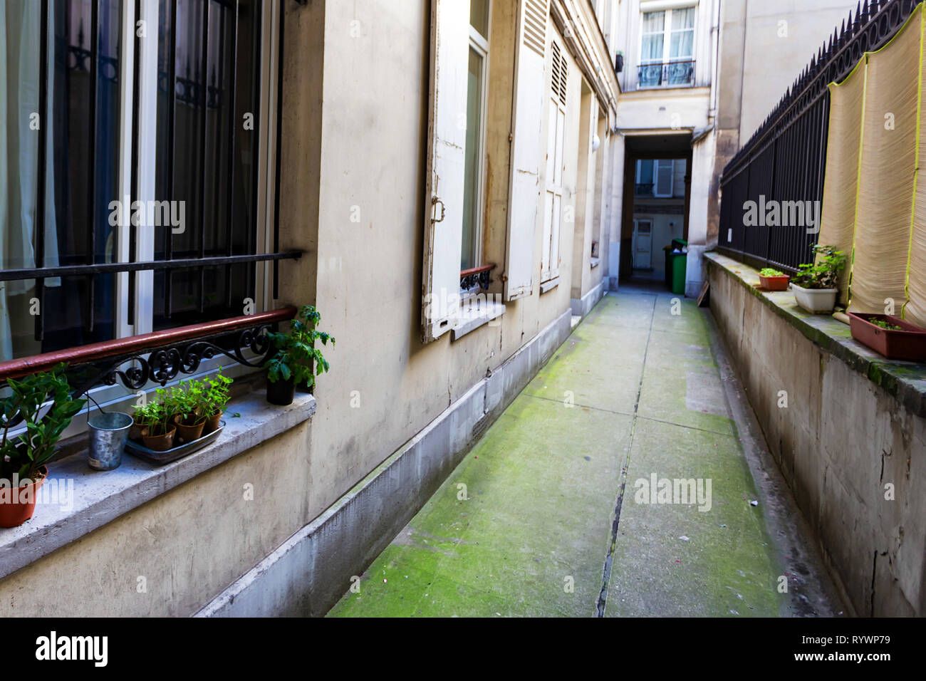 Narrow outdoor passage in the yard near modern building i France Stock ...