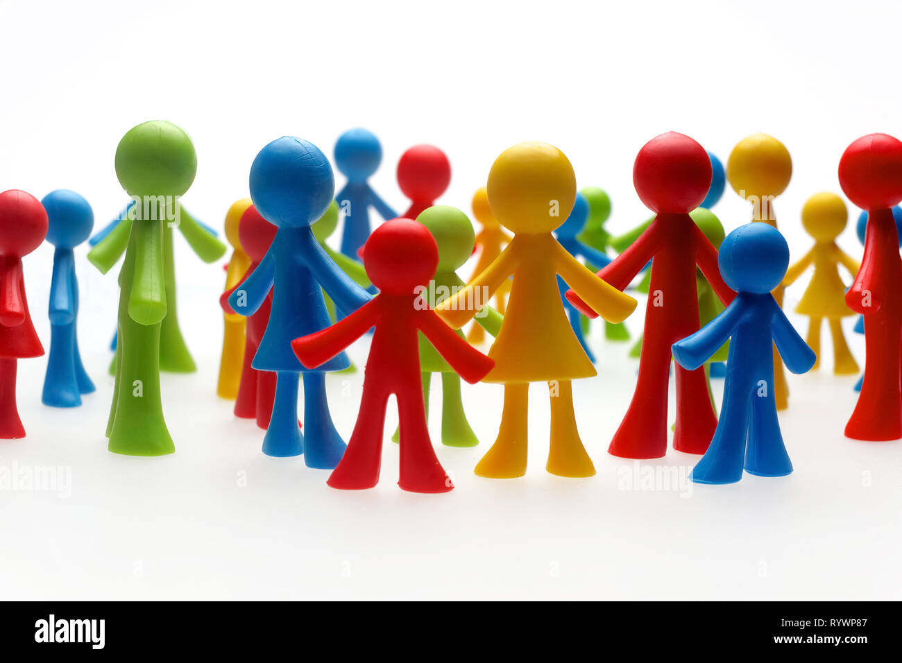 Colorful painted group of people figures Stock Photo - Alamy
