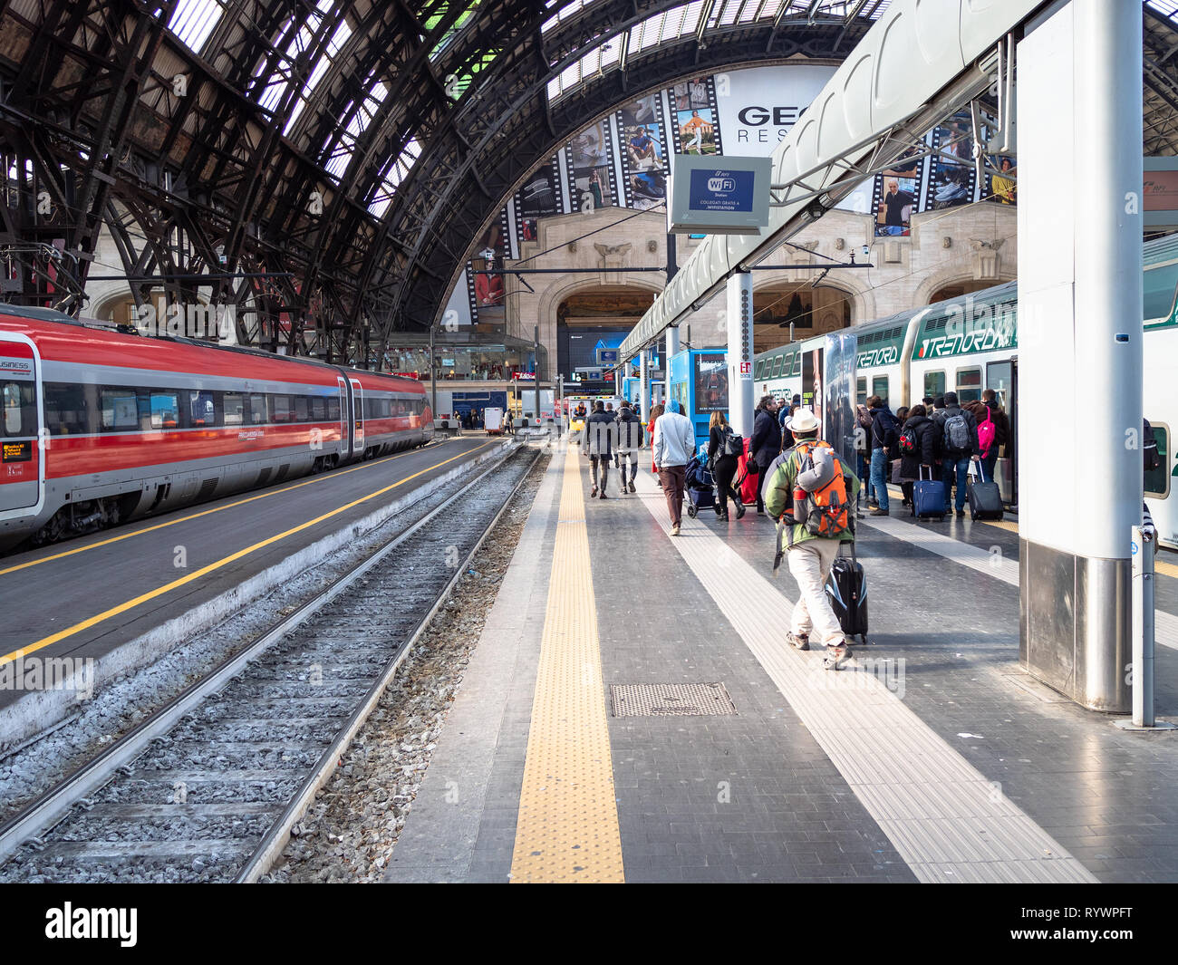 MILAN, ITALY - FEBRUARY 24, 2019: people on railroad platform in ...