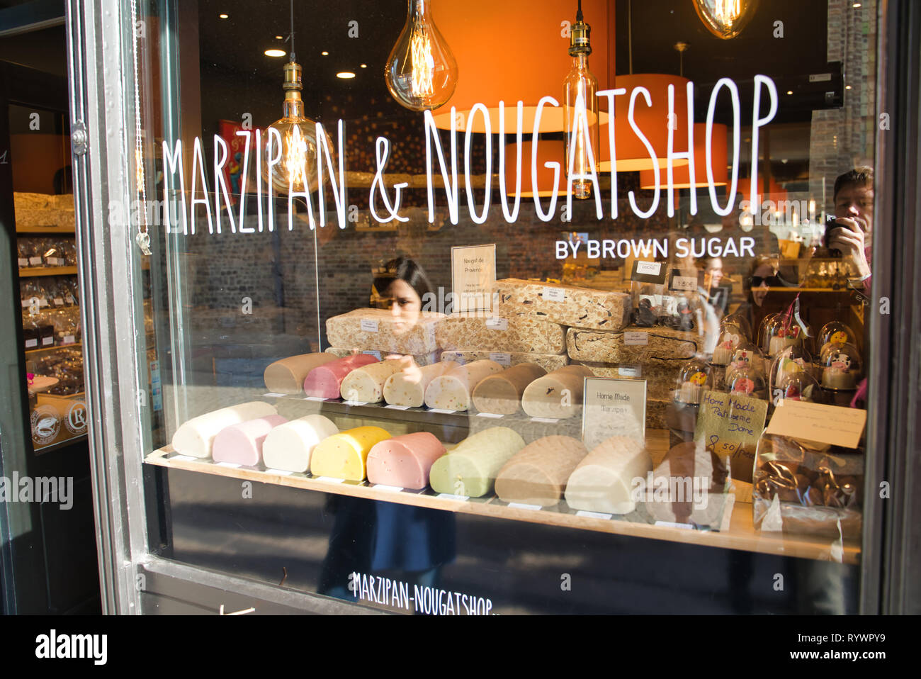 BRUGES, BELGIUM - FEBRUARY 17, 2019: Shop of traditional Belgian sweets ...