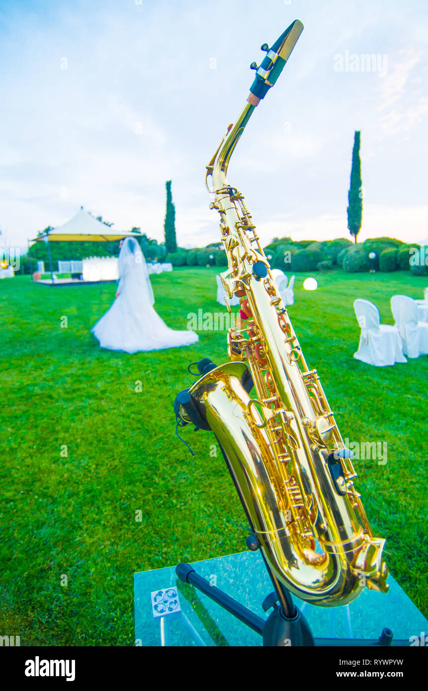 brass saxophone awaits the musician to release sweet musical notes in ...