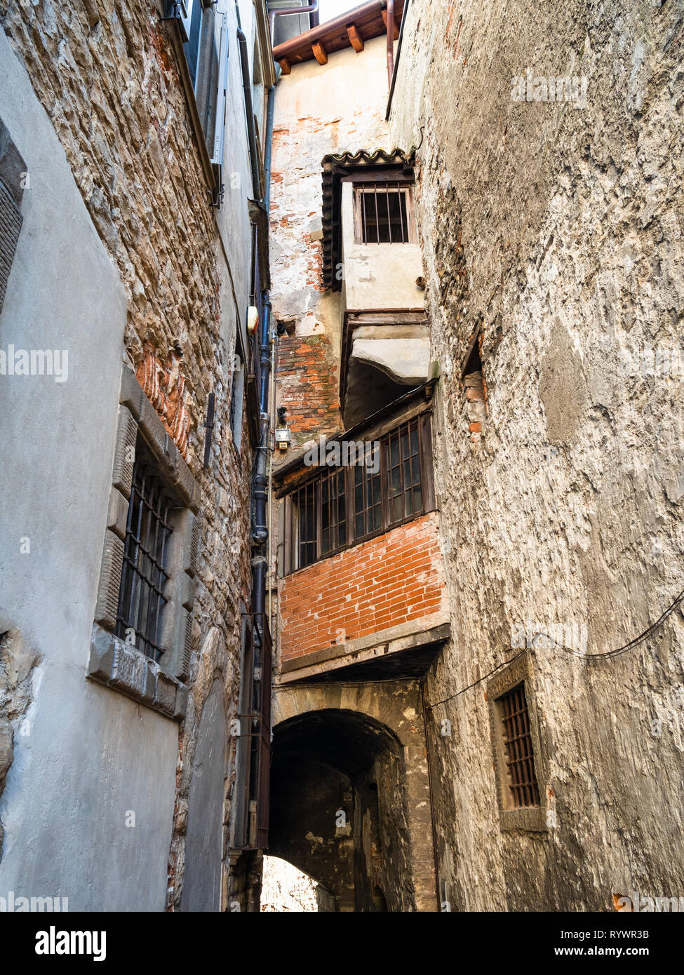 Travel to Italy - shabby old apartment houses over narrow medieval side ...