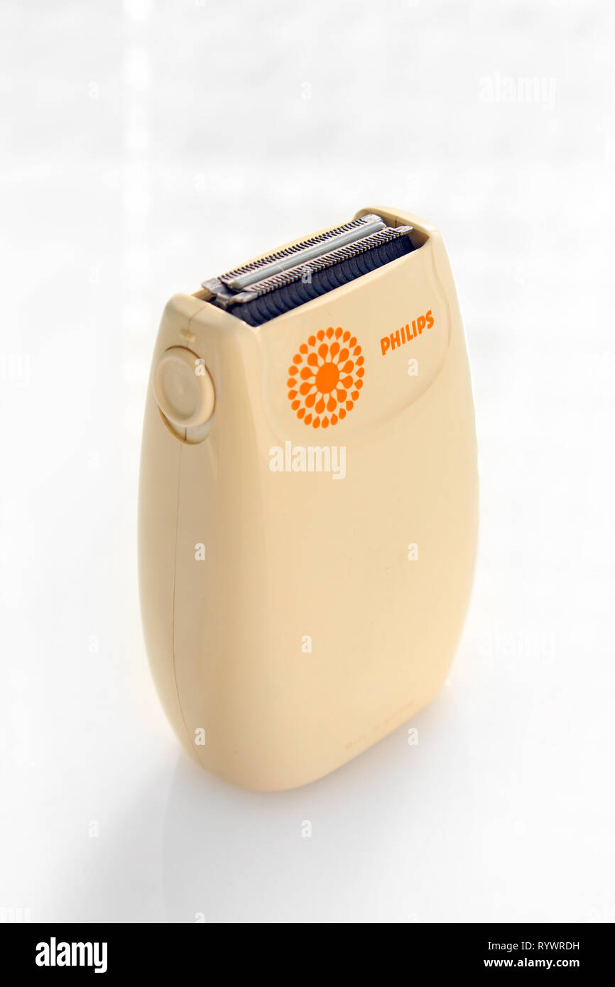 Vintage 70s Philips electric shaver, isolated on white background ...