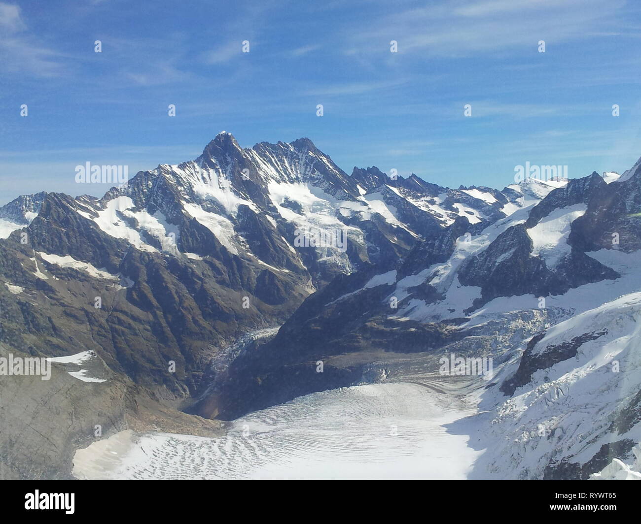 The beautiful Swiss alps with snow capped mountains and adventures of ...