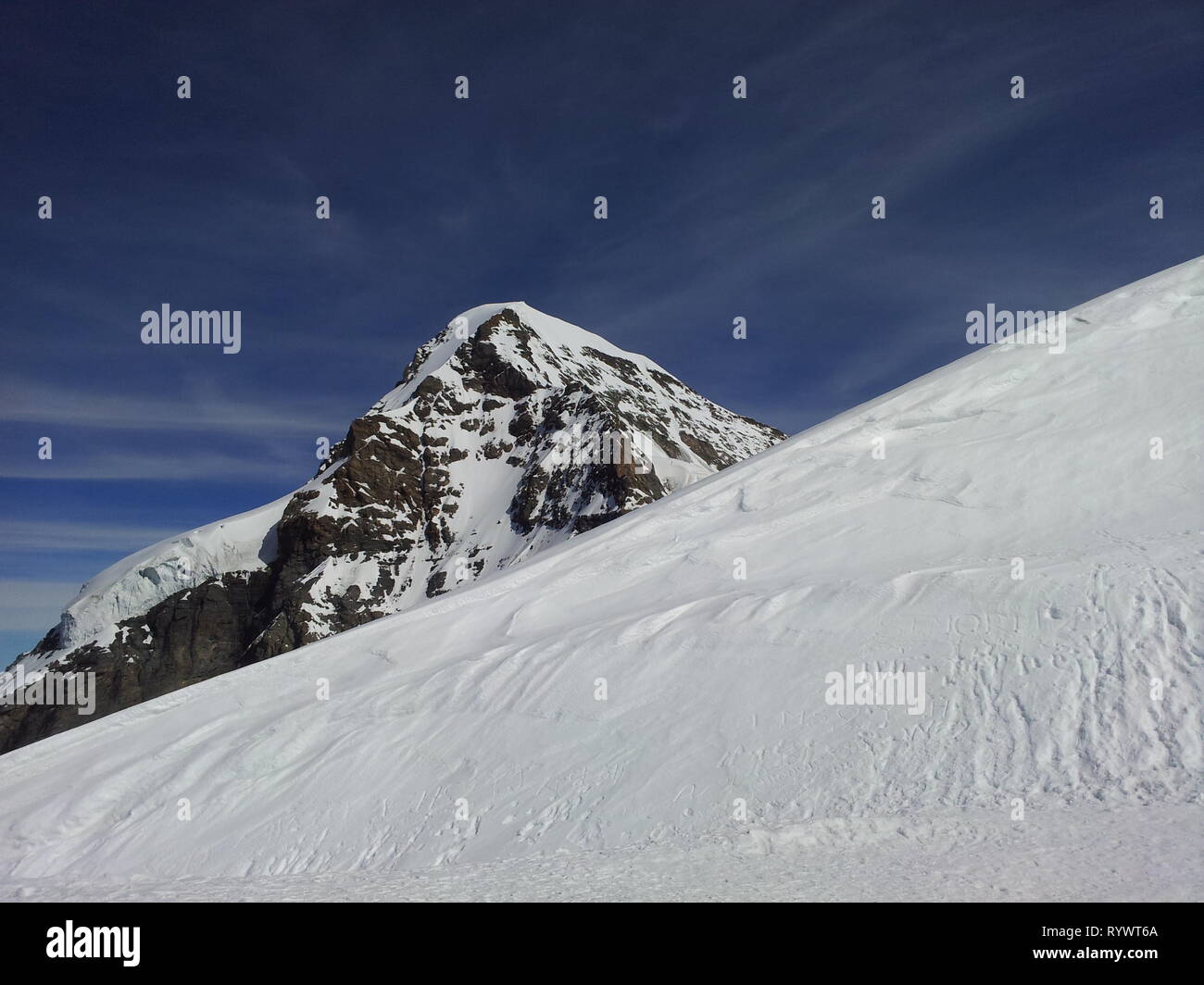 The beautiful Swiss alps with snow capped mountains and adventures of ...